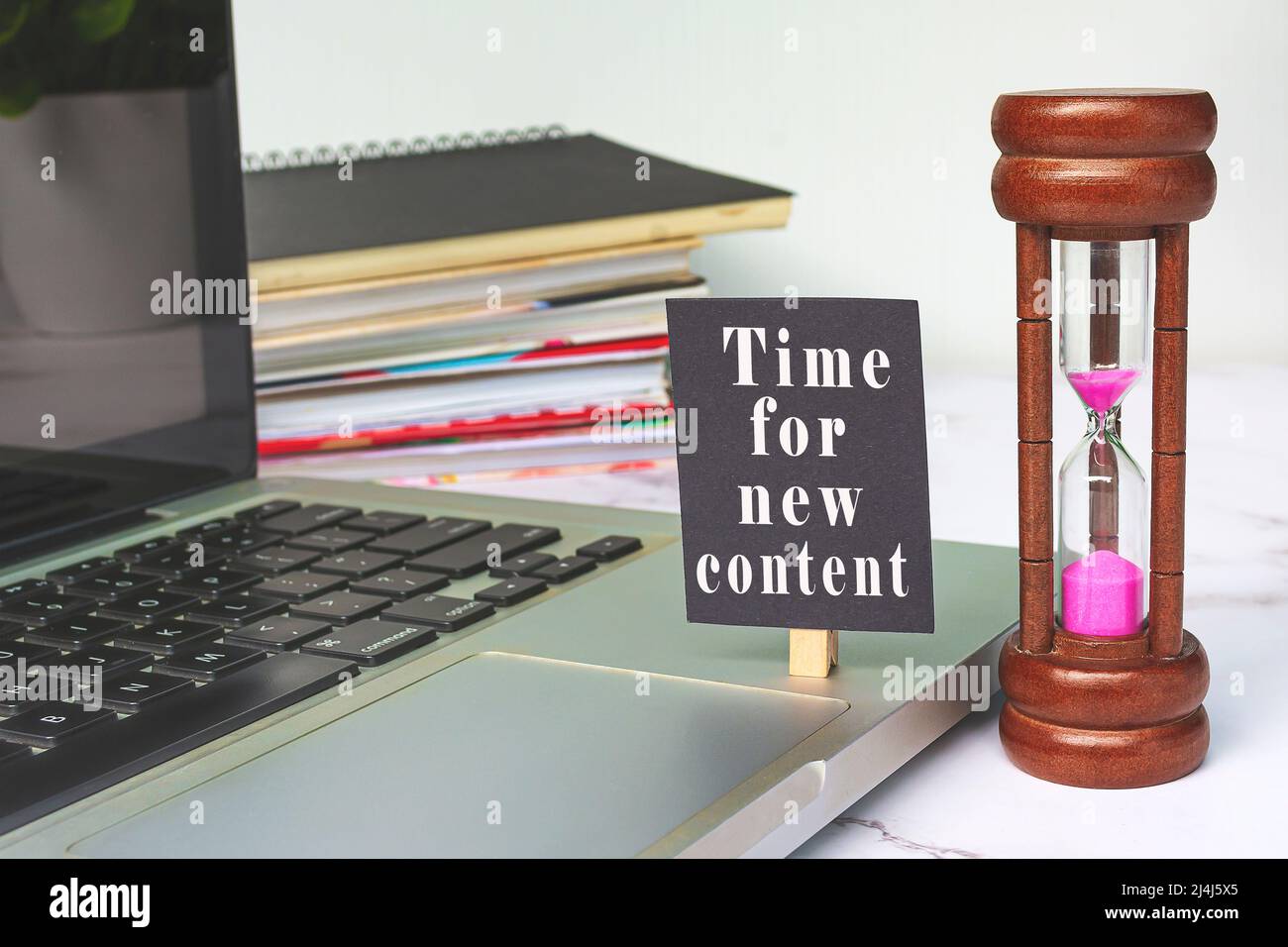 Motivational quote on chalkboard placed on laptop or notebook with ...