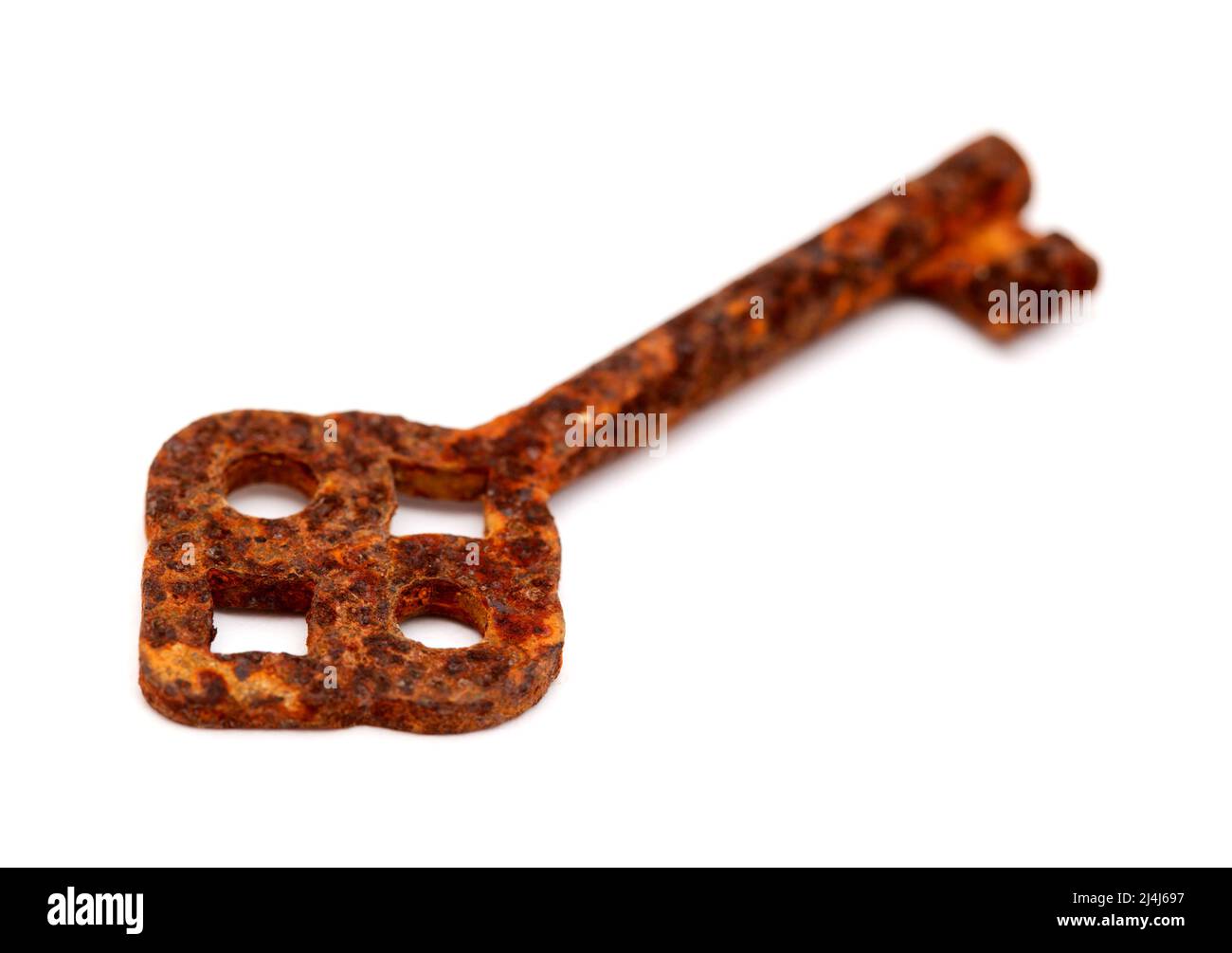 Old very rusty key isolated on white background Stock Photo - Alamy