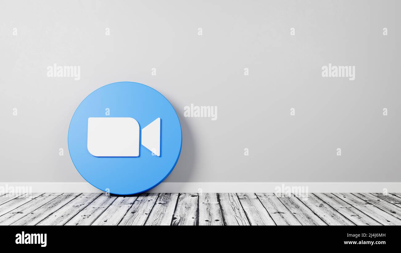 Zoom Logo on Wooden Floor Against Wall Stock Photo - Alamy