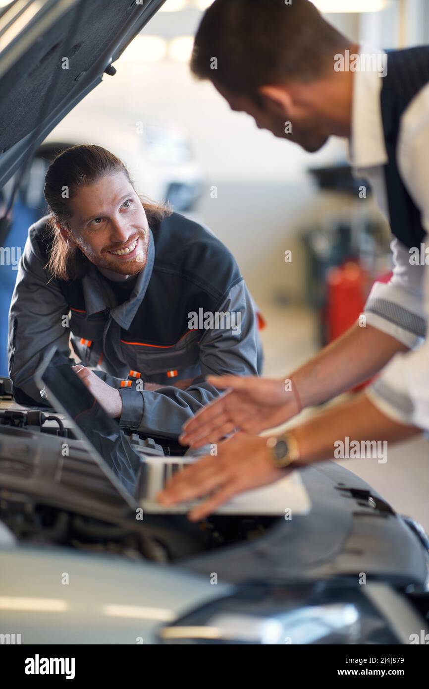 Professional workers in workshop hi-res stock photography and images ...