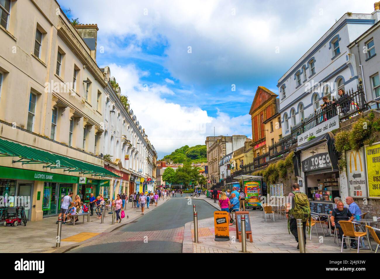 View of the main street of the seaside town of Torquay on the English ...