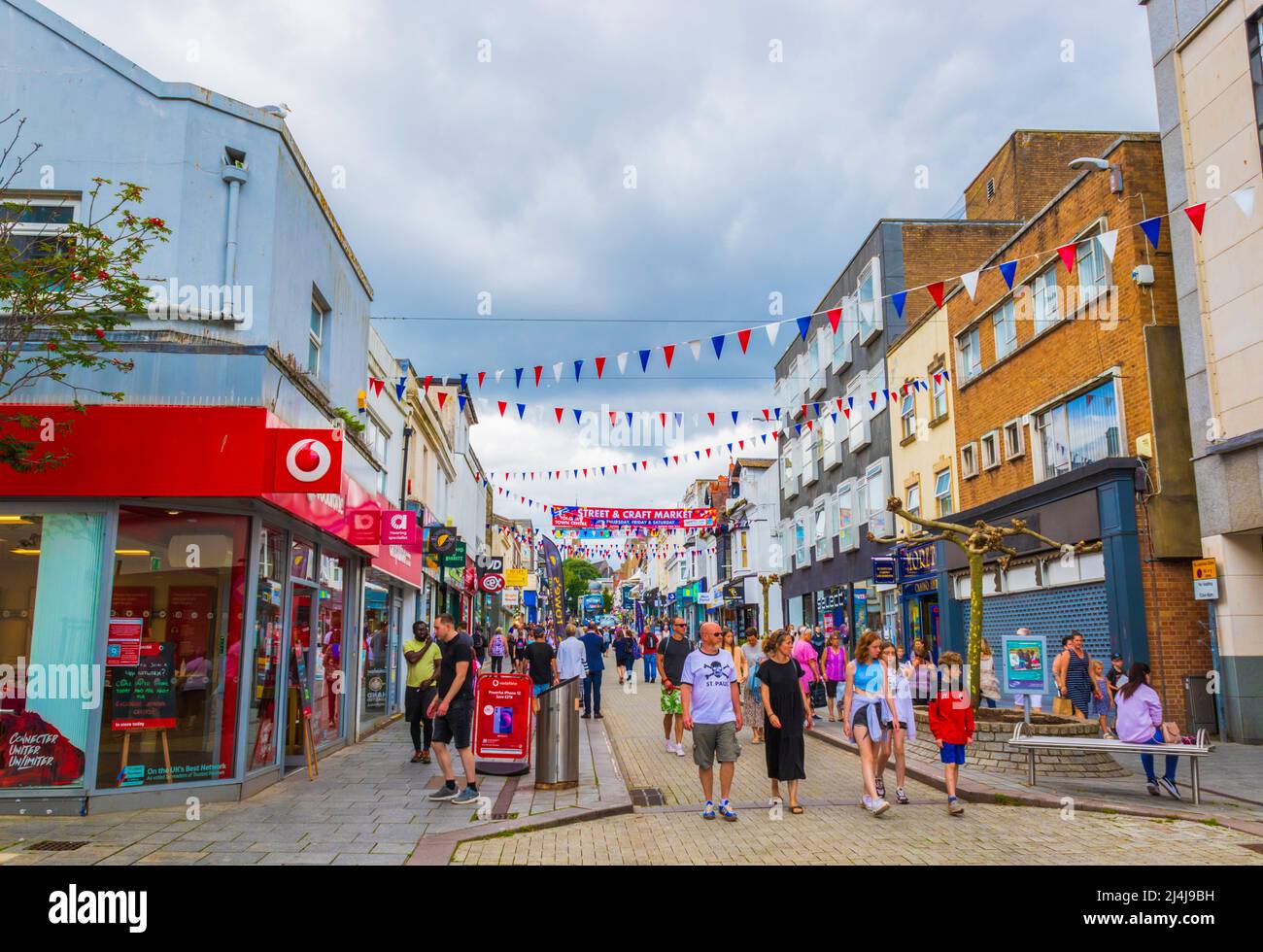View of the main street of the seaside town of Torquay on the English ...