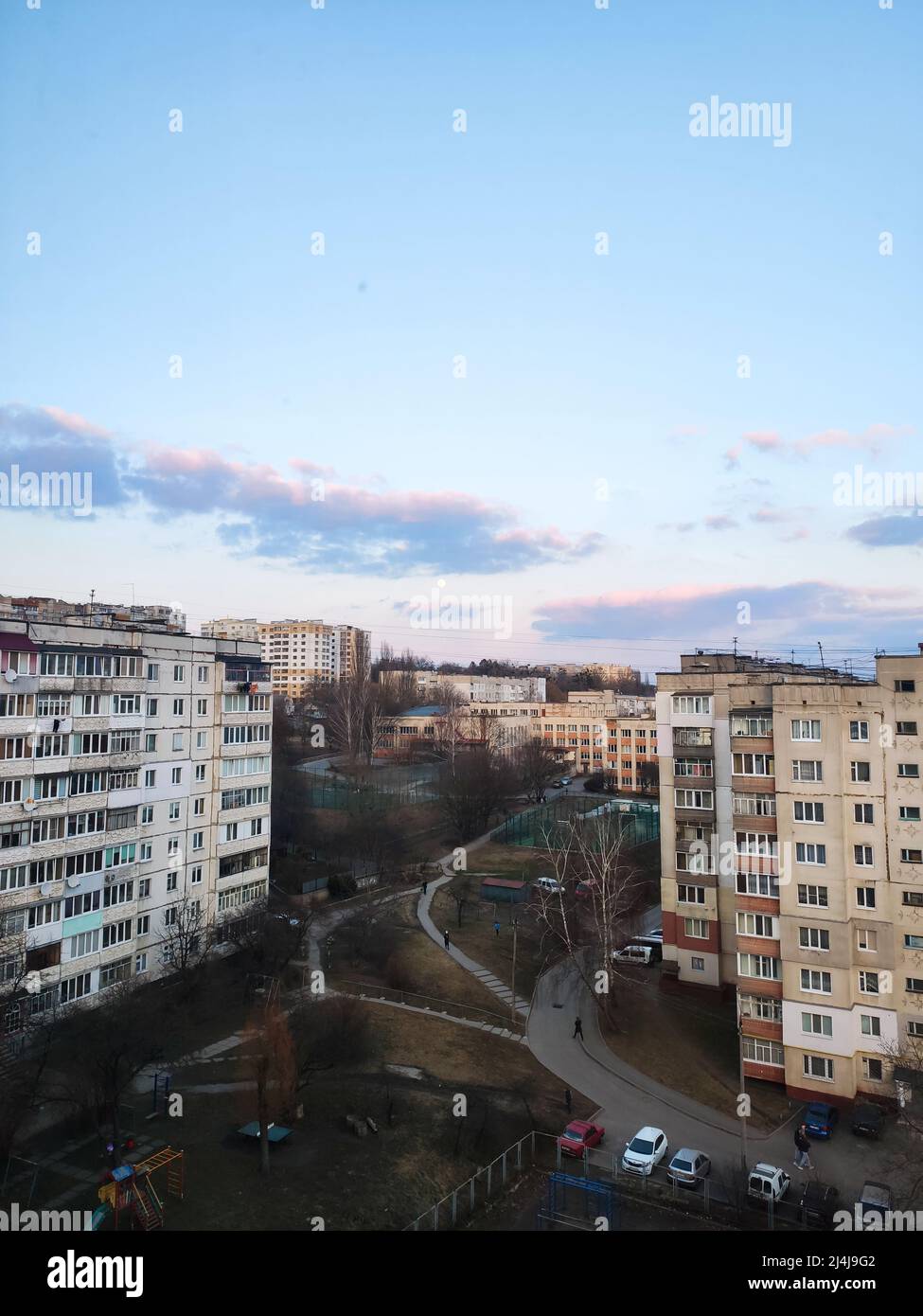 a view of multi-storey apartment buildings in the city from the window ...