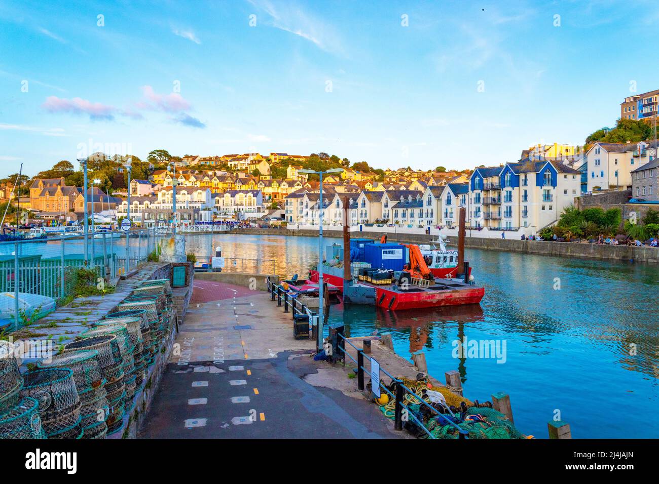 View of Brixham Harbour.Fishing port lined with seafood restaurants ...