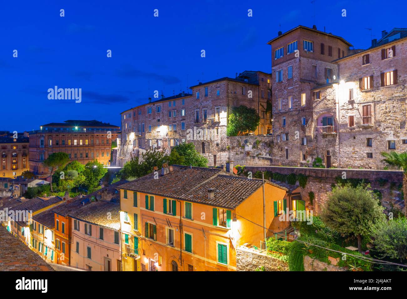 Night view of colorful facades of old houses in Perugia, Italy Stock ...