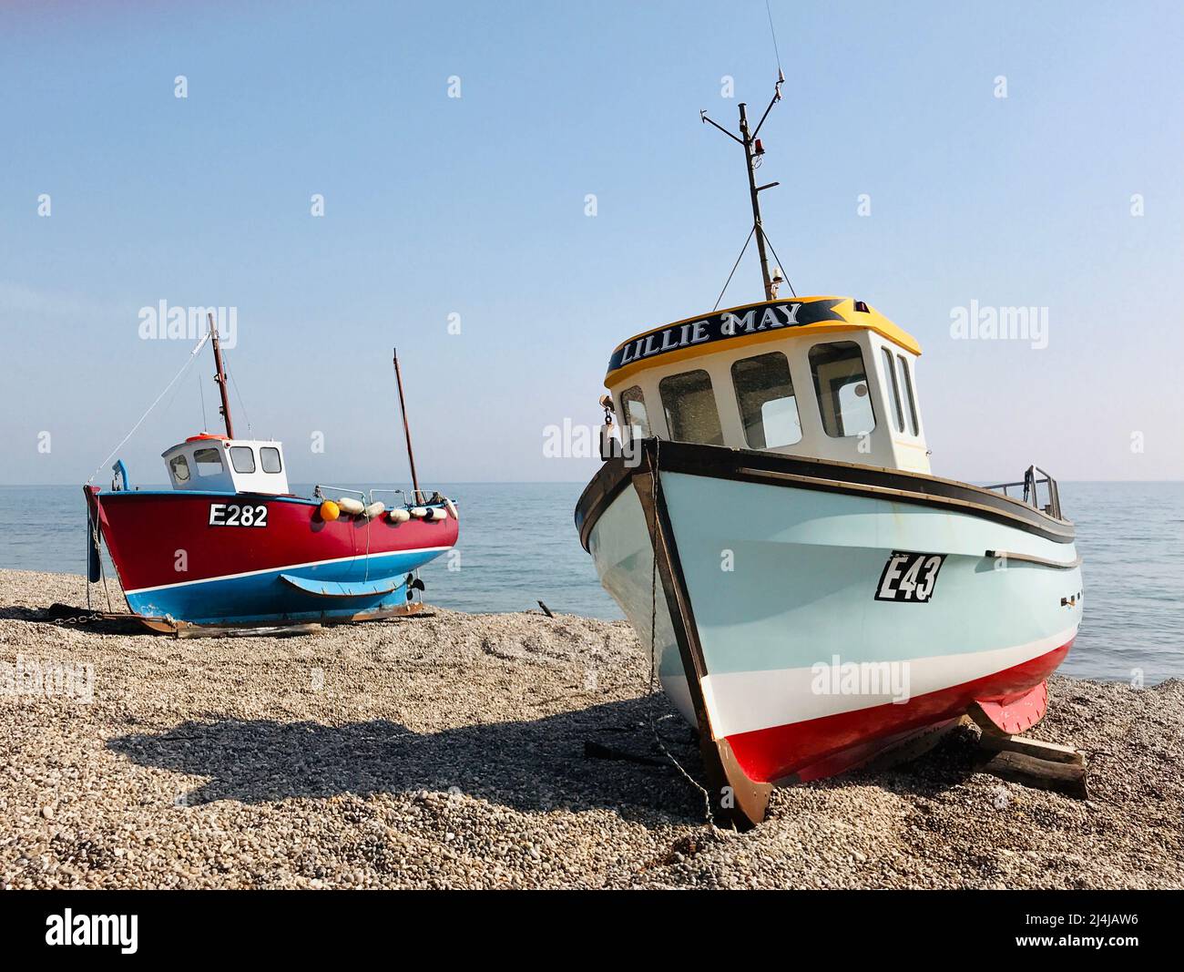 Fishing boats on the beach in Beer, Devon Stock Photo - Alamy