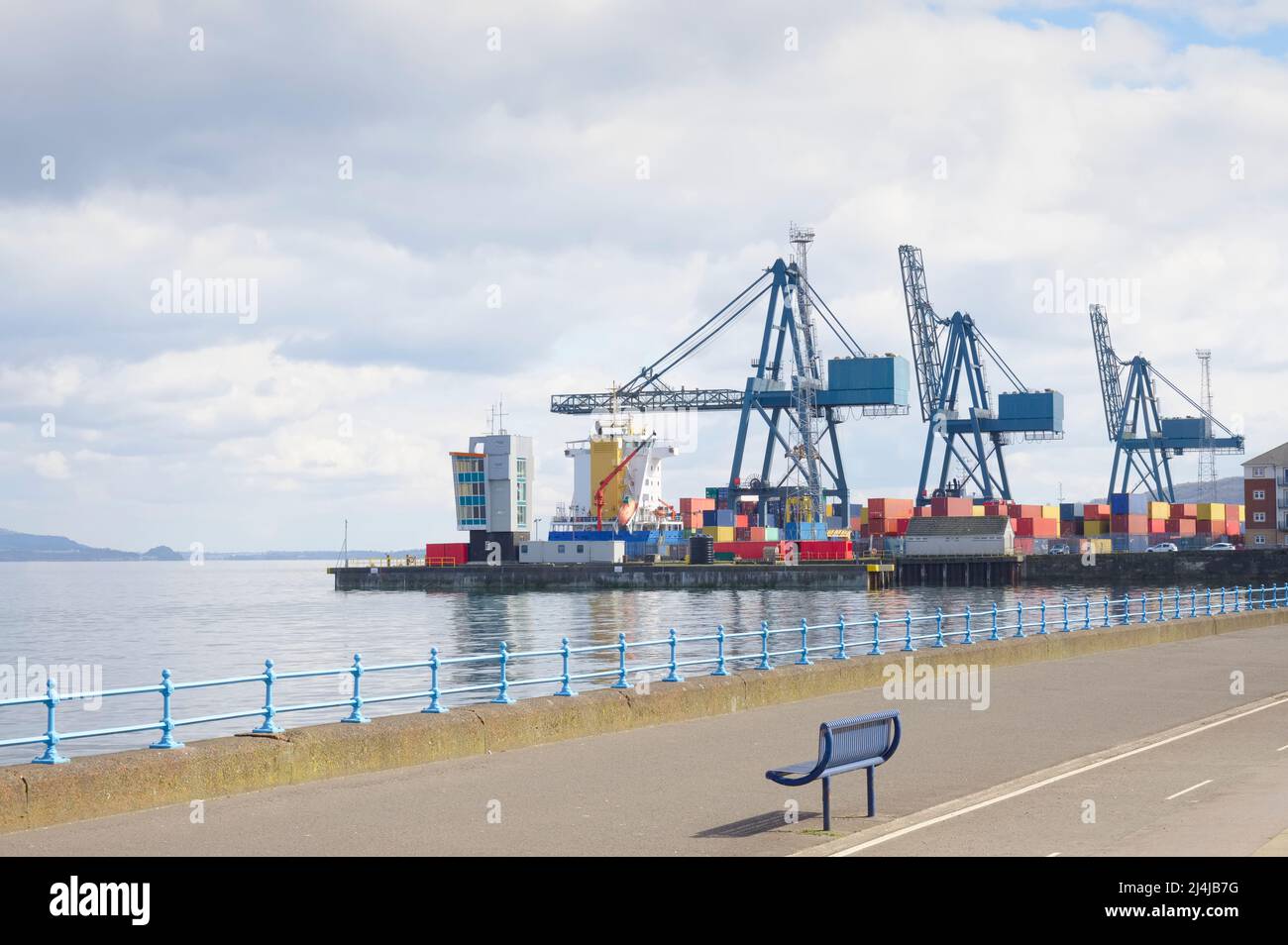 Cranes at logistics port terminal for offloading containers Stock Photo ...