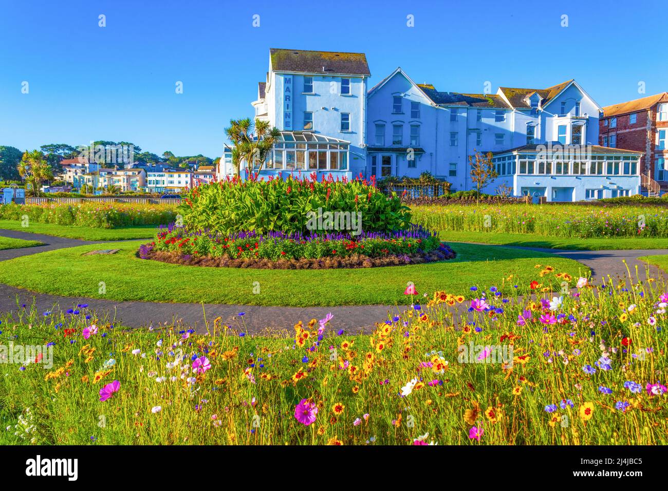 Colorful beachside traditional buildings along the coastal street by ...