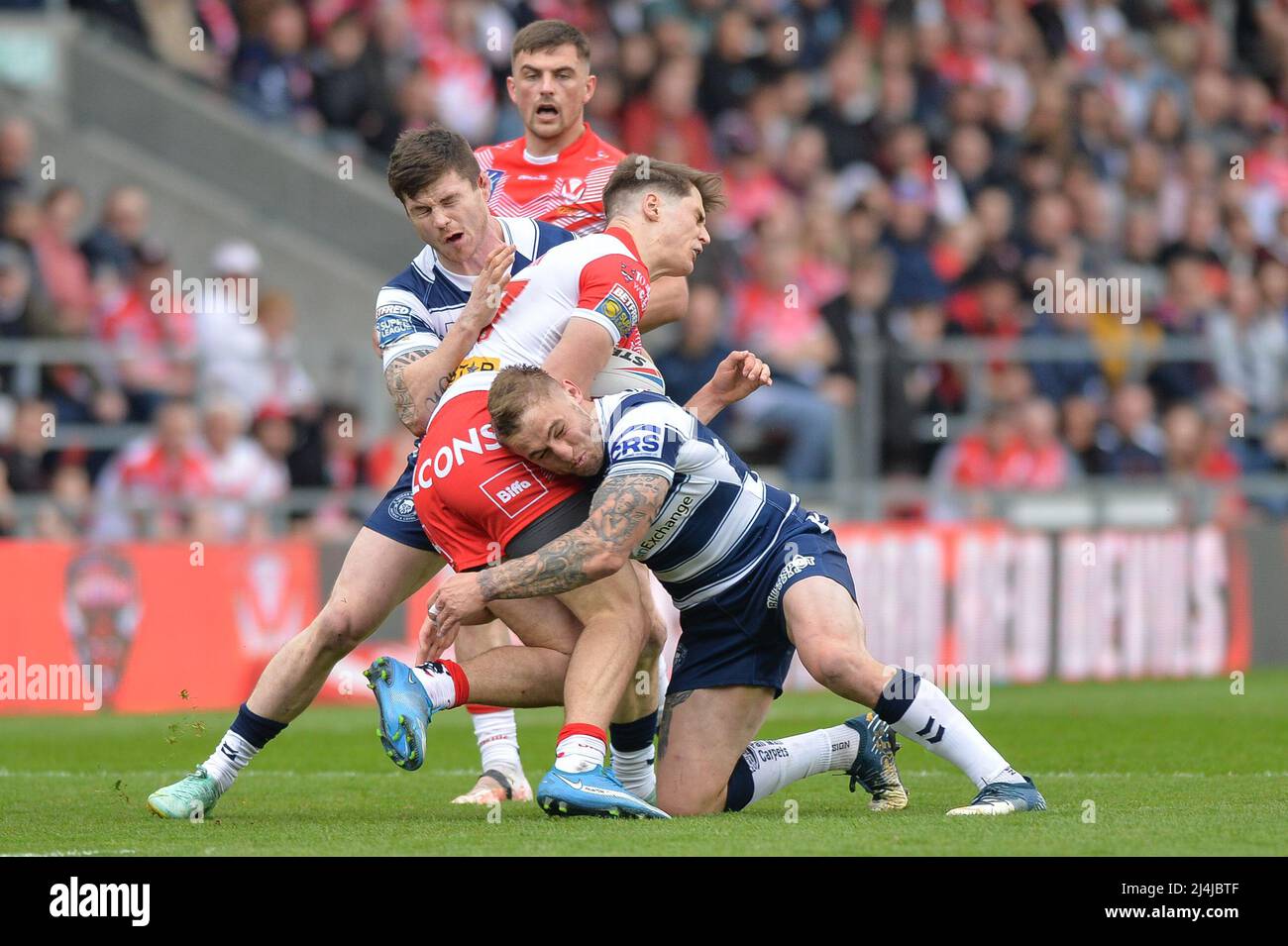 St. Helens, England - 15th April 2022 - Lewis Dodd of St Helens tackled ...