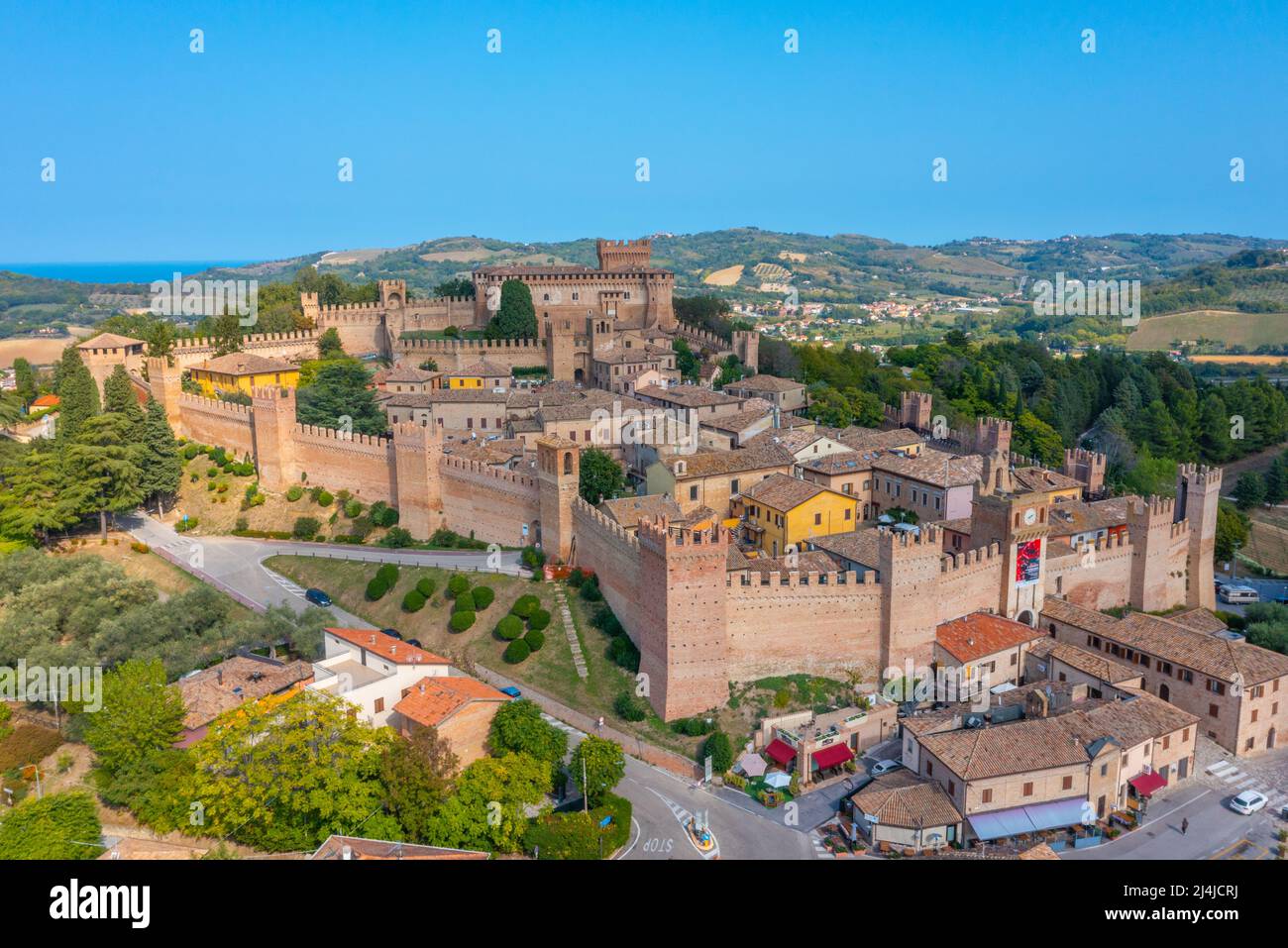 Castello di Gradara overlooking foritified village beneath, Italy Stock ...