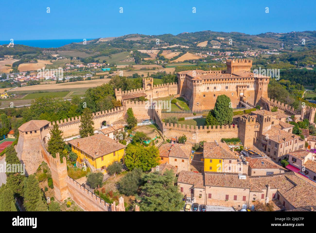 Castello di Gradara overlooking foritified village beneath, Italy Stock ...