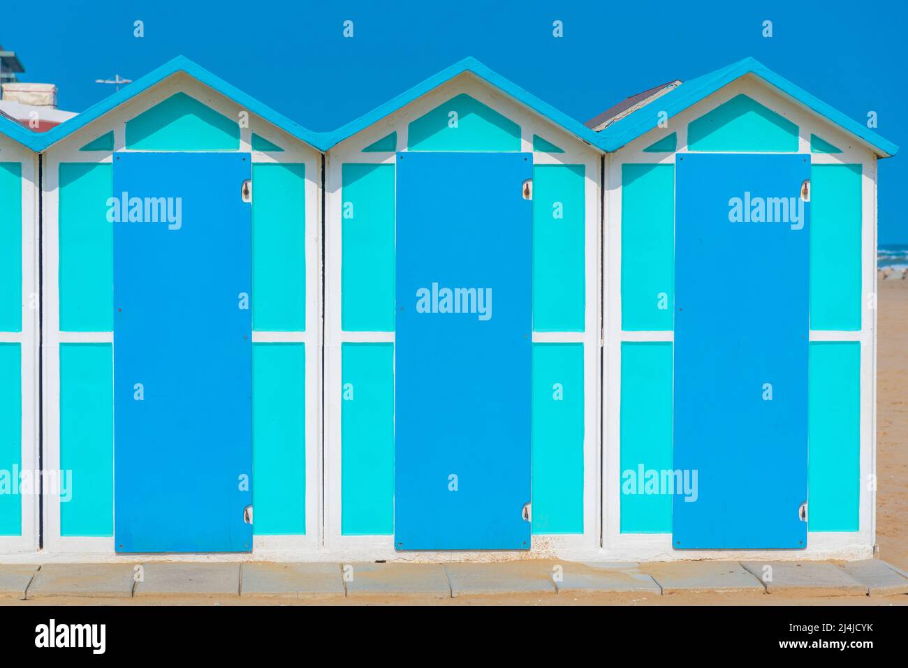 Colourful changing rooms on a beach in Pesaro, Italy Stock Photo - Alamy