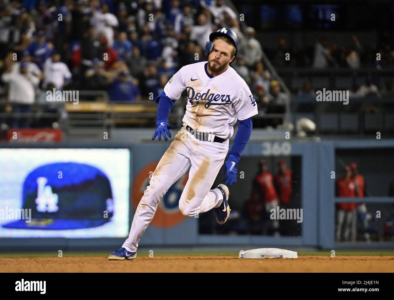 Los Angeles Dodgers' second baseman Gavin Lux runs to third on a triple ...