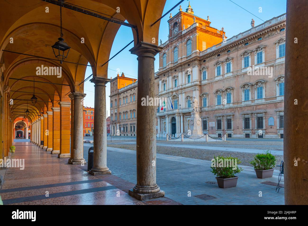Palazzo Ducale viewed through an arcade in Italian town Modena Stock ...