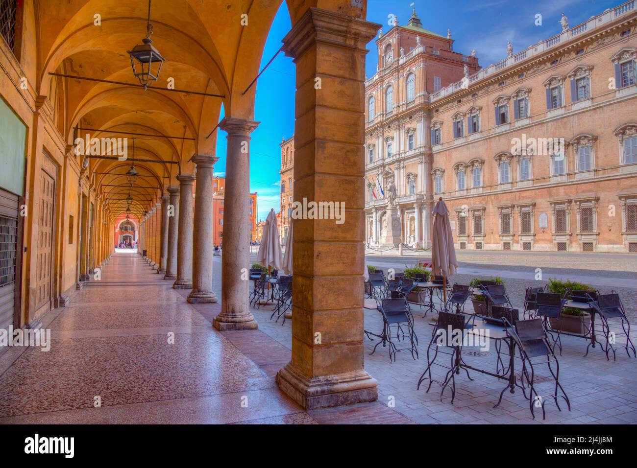 Palazzo Ducale viewed through an arcade in Italian town Modena Stock ...