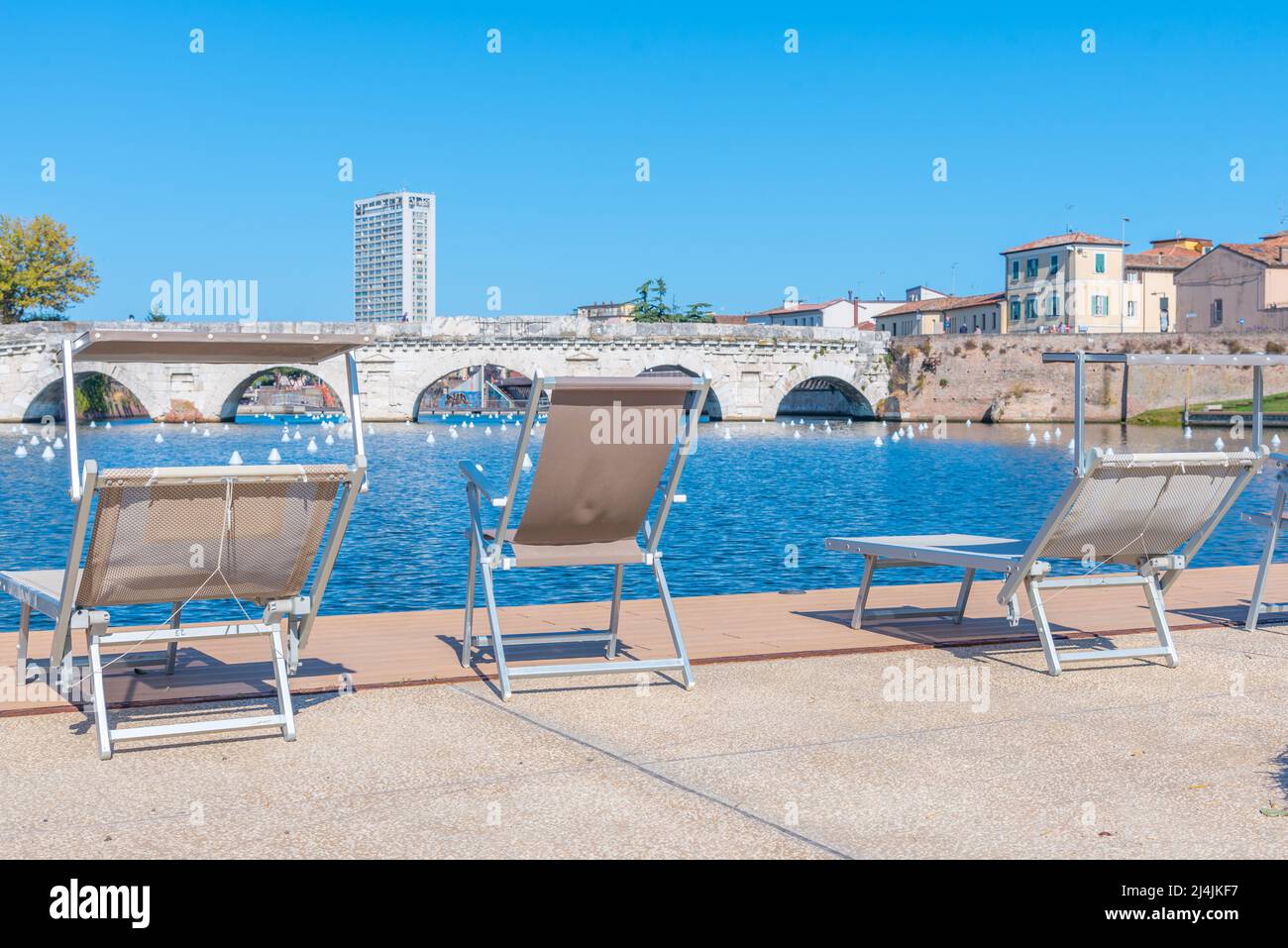 Sundeck overlooking Bridge of Tiberius (Ponte di Tiberio) in Rimini ...