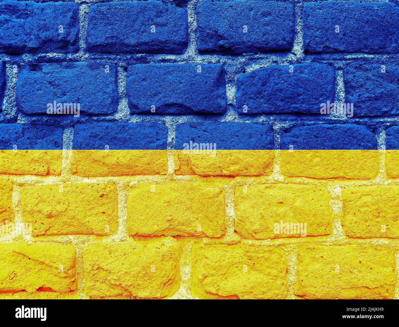 Stand with Ukraine backdrop: Ukrainian flag painted on brick wall Stock ...