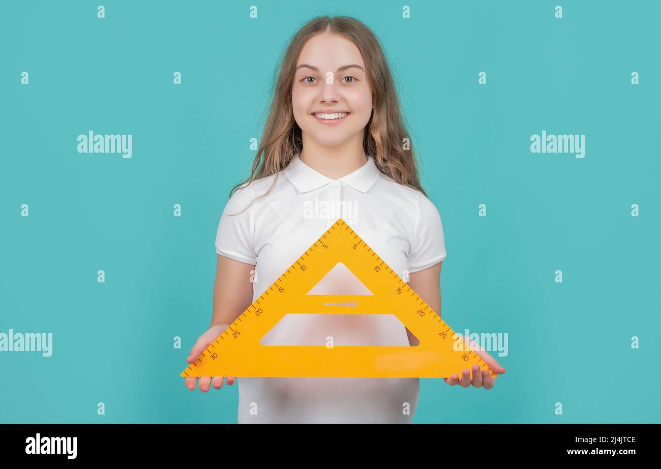 cheerful child with math triangle measuring tool Stock Photo - Alamy