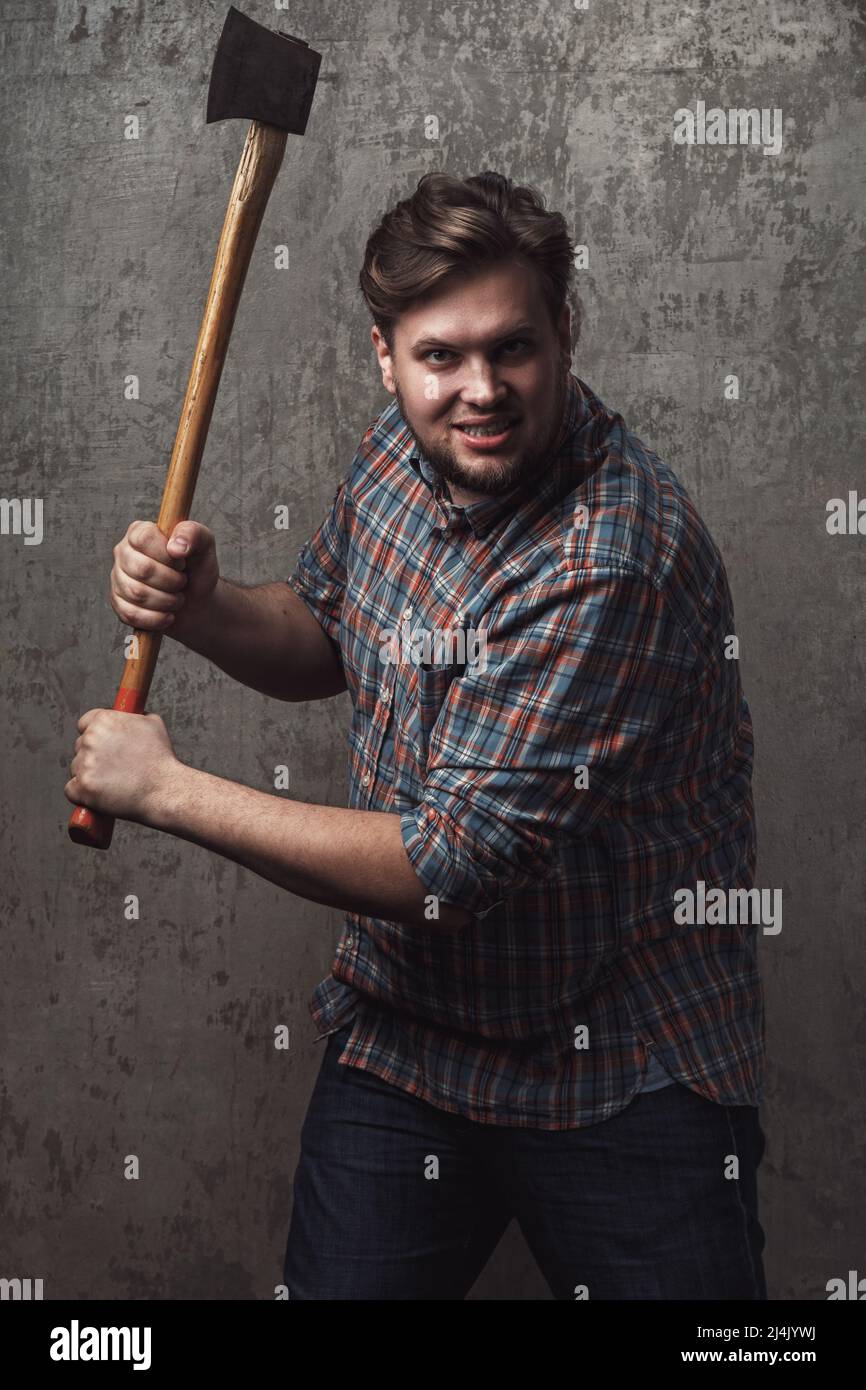 Angry holding axe hi-res stock photography and images - Alamy