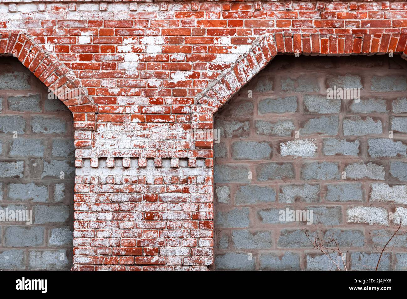 Red brick wall in white weathered paint, exterior and masonry concept ...