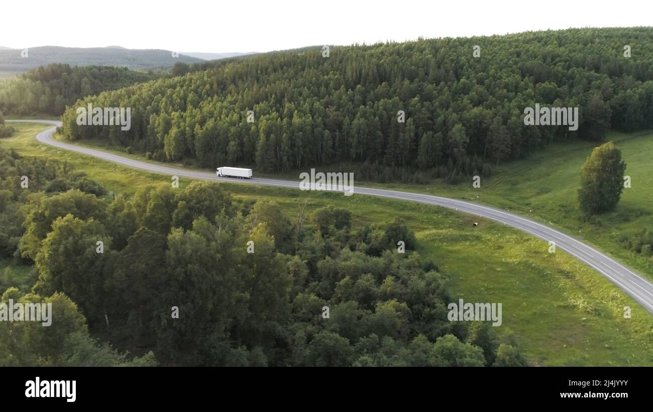 Panorama with truck driving on highway in summer. Action. Beautiful ...