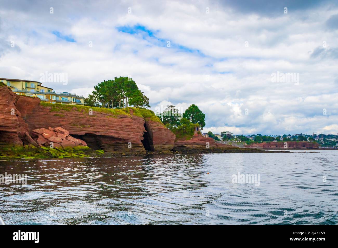 View of Paignton Beach-A long pier juts out from this popular, sandy ...