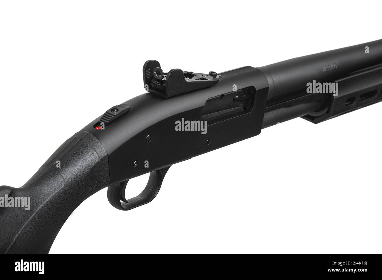 Pump-action 12 gauge shotgun isolated on a white background. Close-up ...