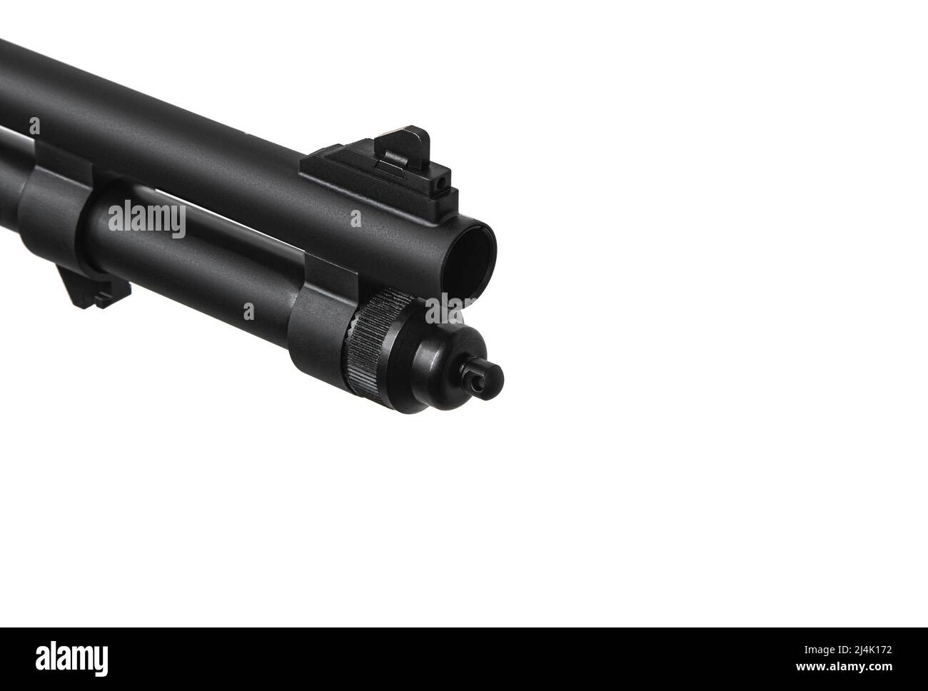 Pump-action 12 gauge shotgun isolated on a white background. Close-up ...