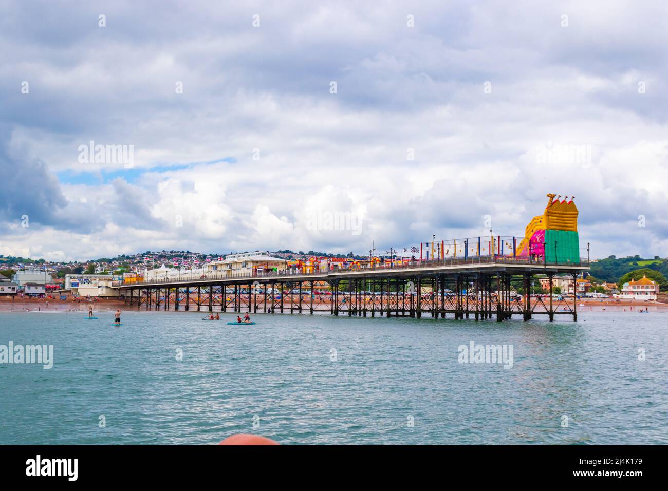 View of Paignton Beach-A long pier juts out from this popular, sandy ...
