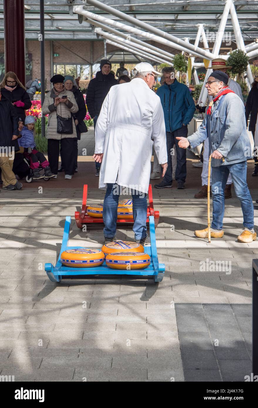 a farmer and cheese buyer using the famous hand slapping method to buy ...