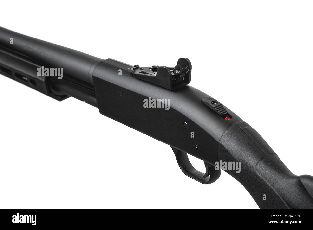 Pump-action 12 gauge shotgun isolated on a white background. Close-up ...