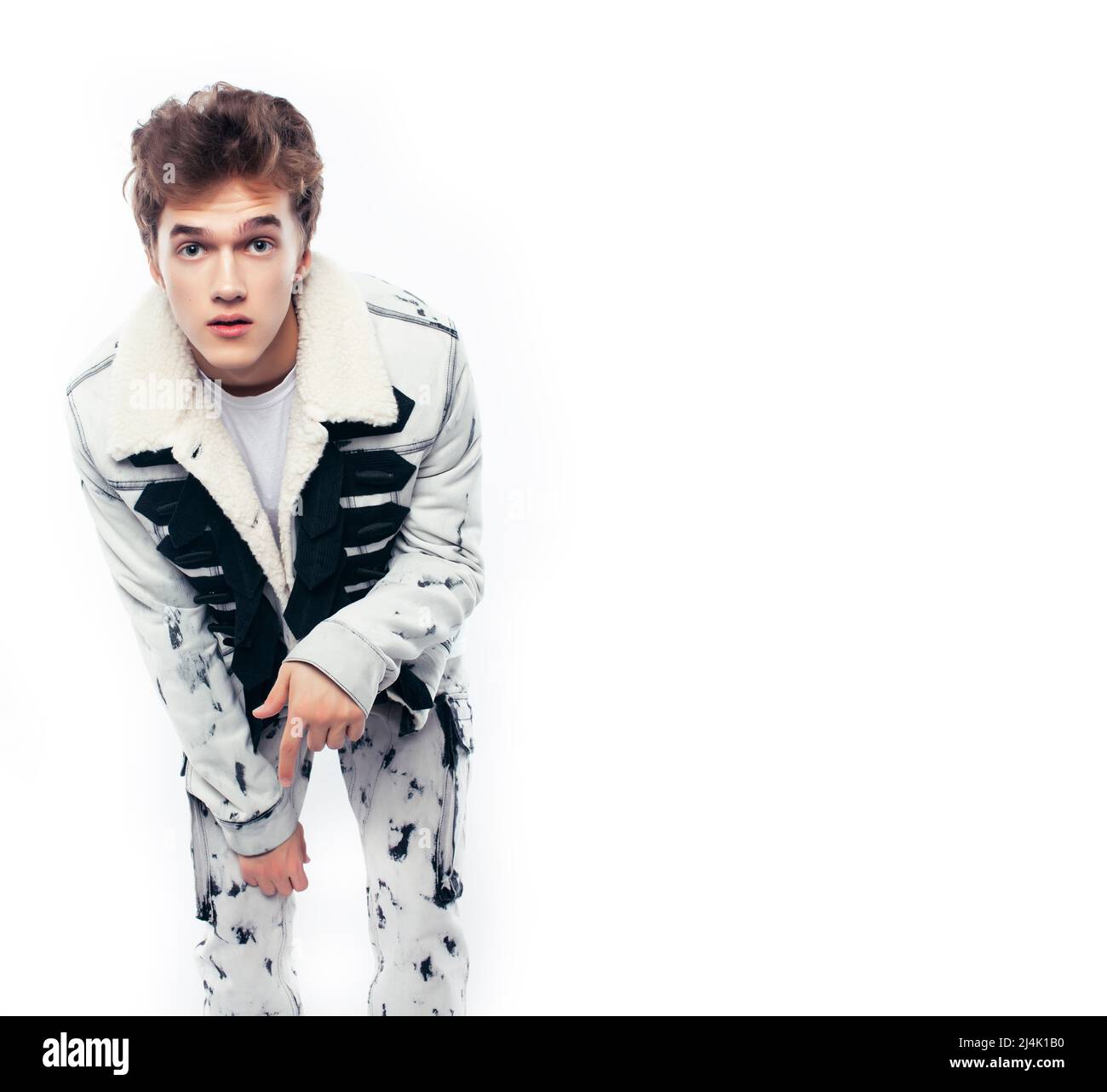 young pretty guy posing emotional cheerful isolated on white background ...