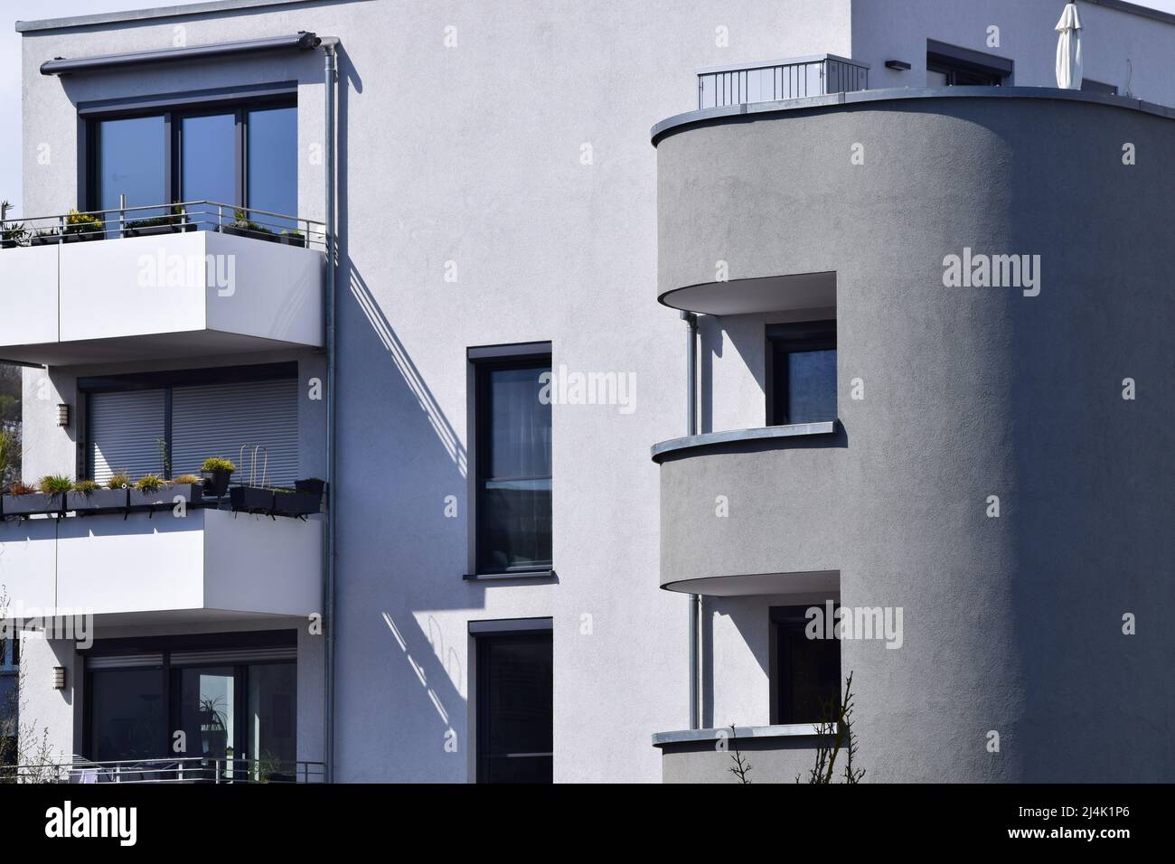 a round Balcony pulled around the Corner on a modern House Stock Photo ...
