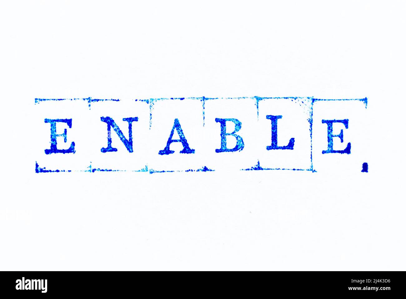 Blue color ink rubber stamp in word enable on white paper background ...