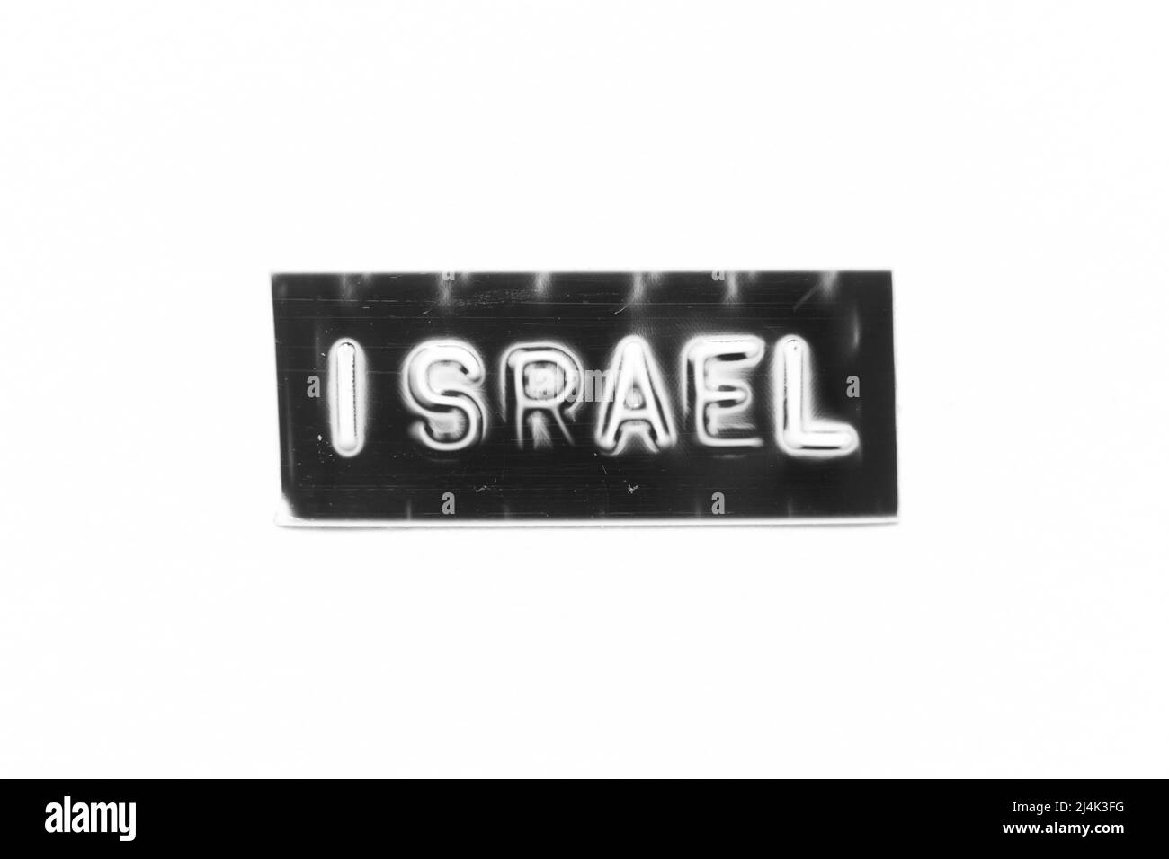 Black color banner that have embossed letter with word israel on white ...