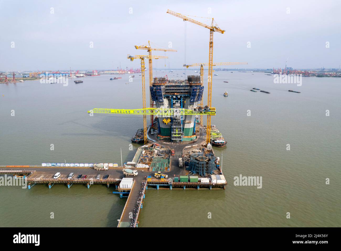 TAIXING, CHINA - APRIL 16, 2022 - Workers pour concrete on the beams of ...