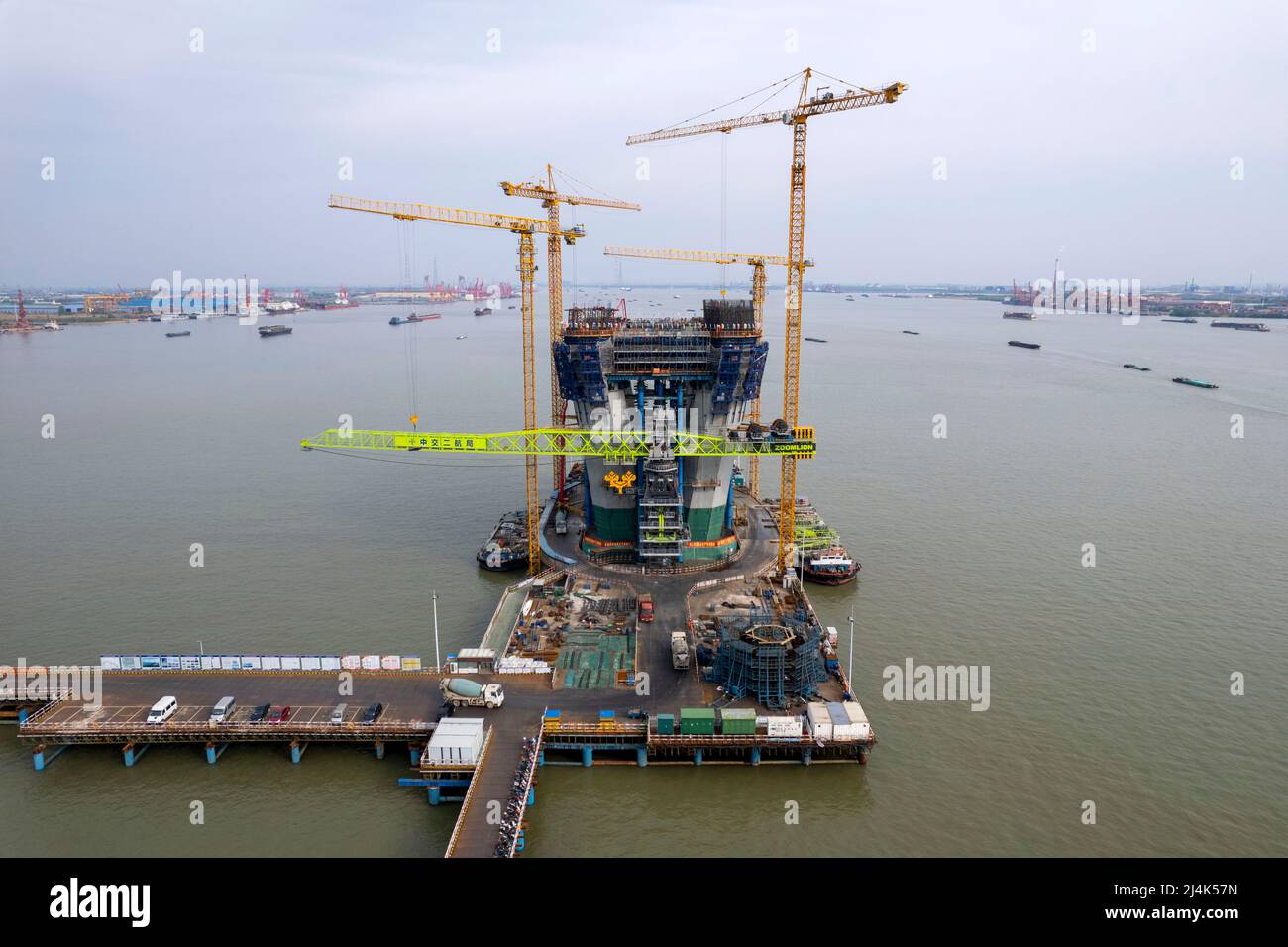 TAIXING, CHINA - APRIL 16, 2022 - Workers pour concrete on the beams of ...