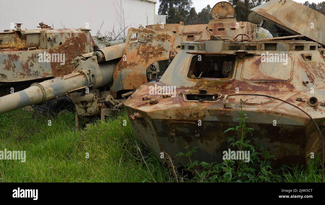 Rusty Soviet fighting vehicles and guns used as target for shooting by ...