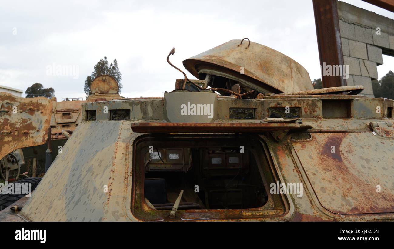 Rusty Soviet fighting vehicles and guns used as target for shooting by ...