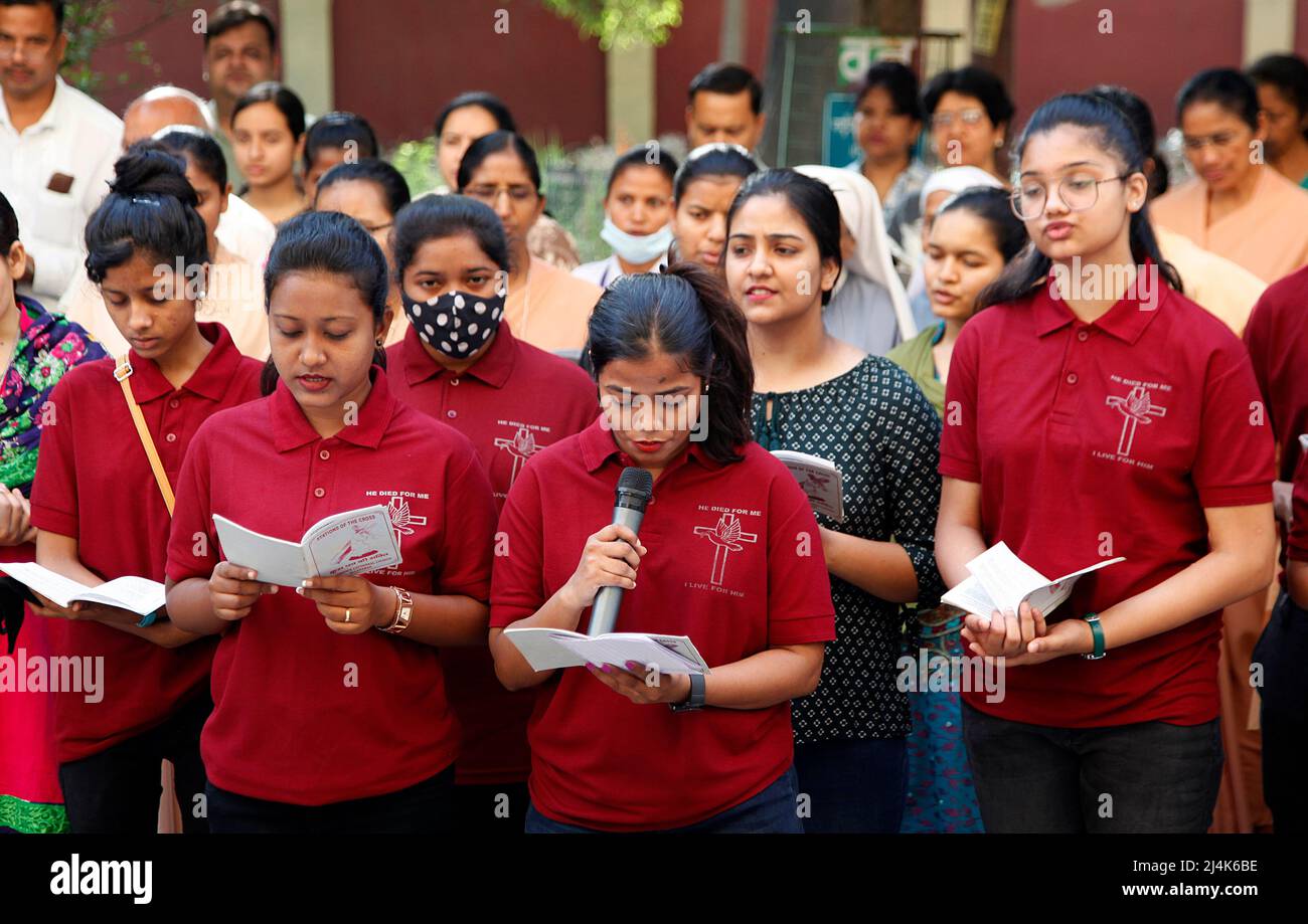 Indian Christian people take part in prayer and religious procession on ...