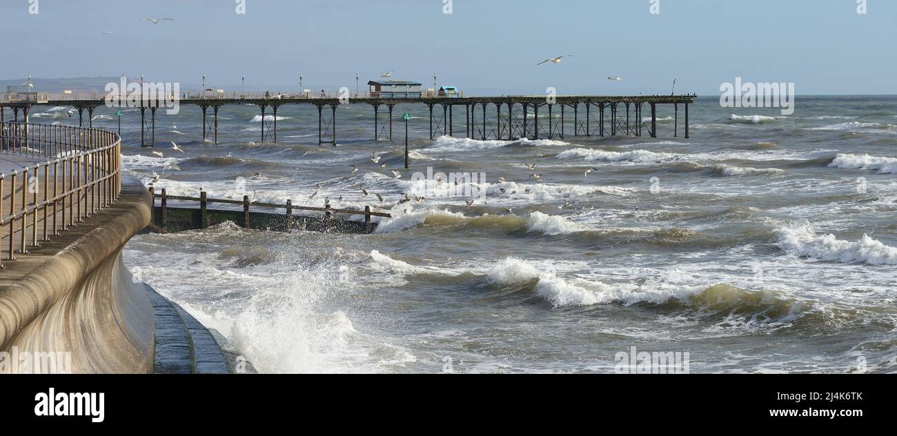 Waves crashing against the seawall at high tide, Teignmouth, South ...