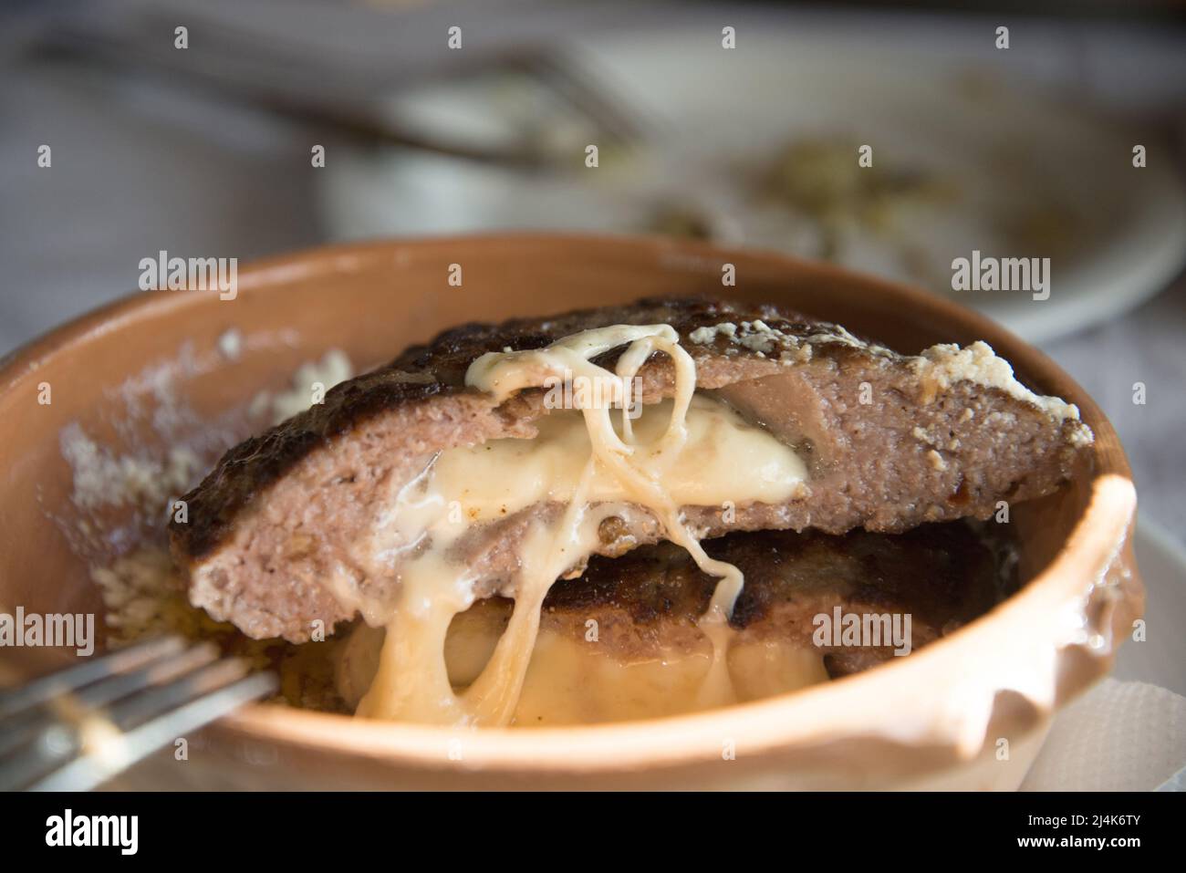 burger cut in half with cheese inside,shallow dof Stock Photo - Alamy
