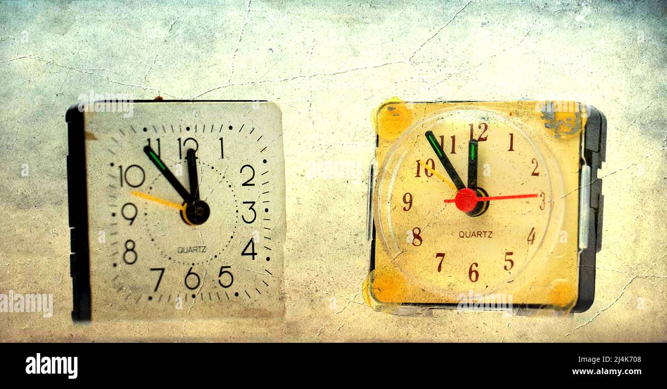 pictureof a vintage damaged alarm clock on white Stock Photo - Alamy