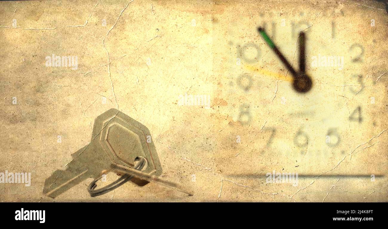 picture of a keys in front of vintage alarm clock Stock Photo - Alamy