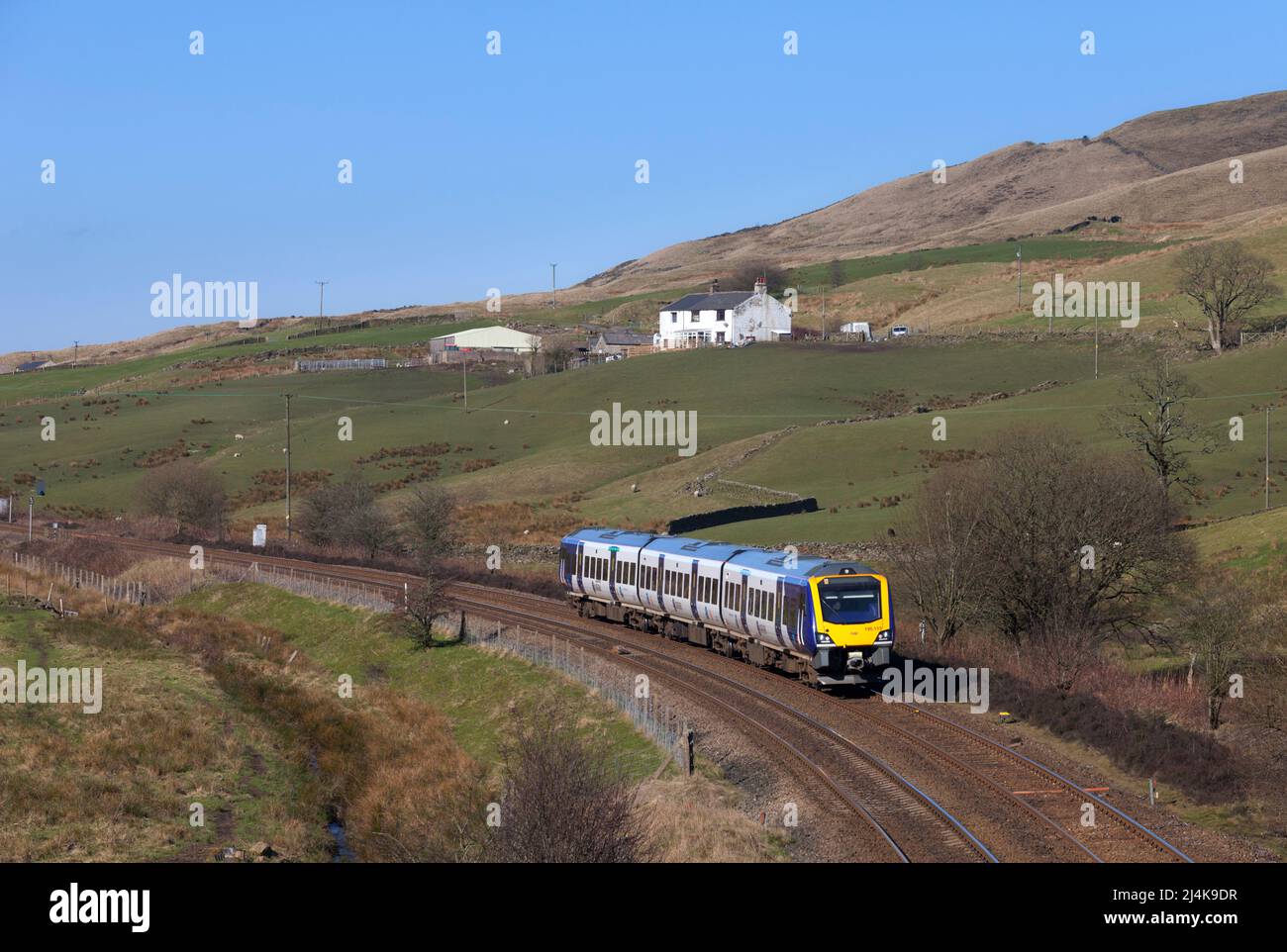 Northern Rail CAF class 195 diesel train 195113 passing Dean Farm, Copy ...