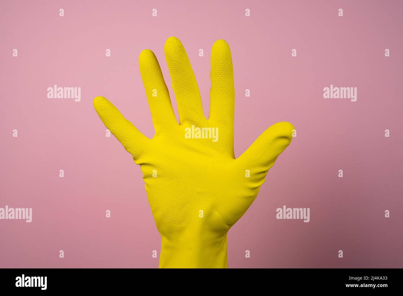 Hand wearing rubber glove hi-res stock photography and images - Alamy
