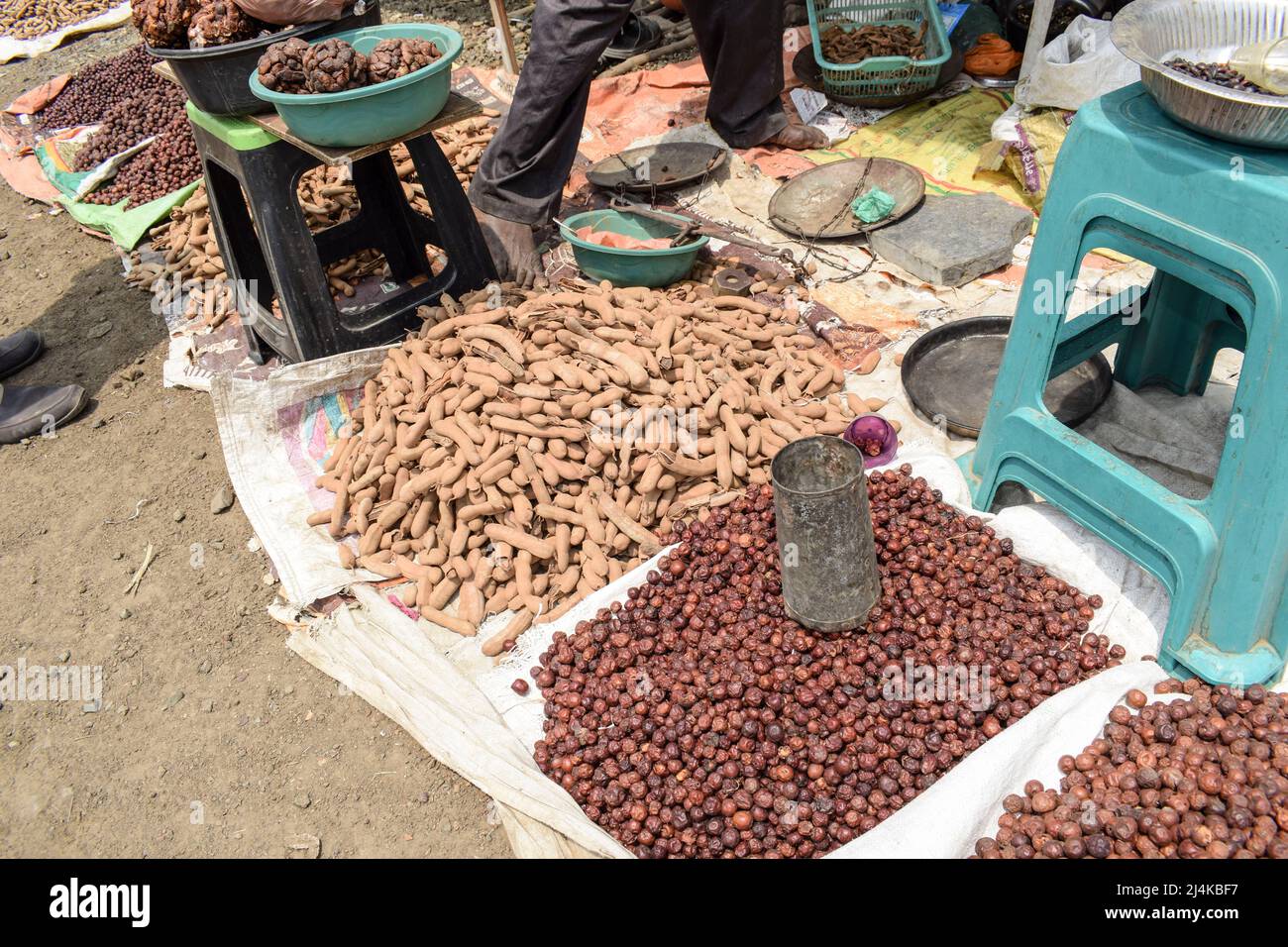 Road side vegetable market Person selling wild Indian traditional ...