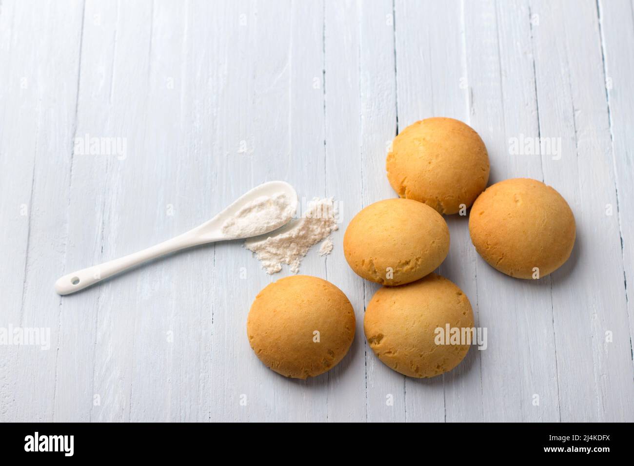 Homemade gluten free cottage cheese rice cookies and spoon with rice ...