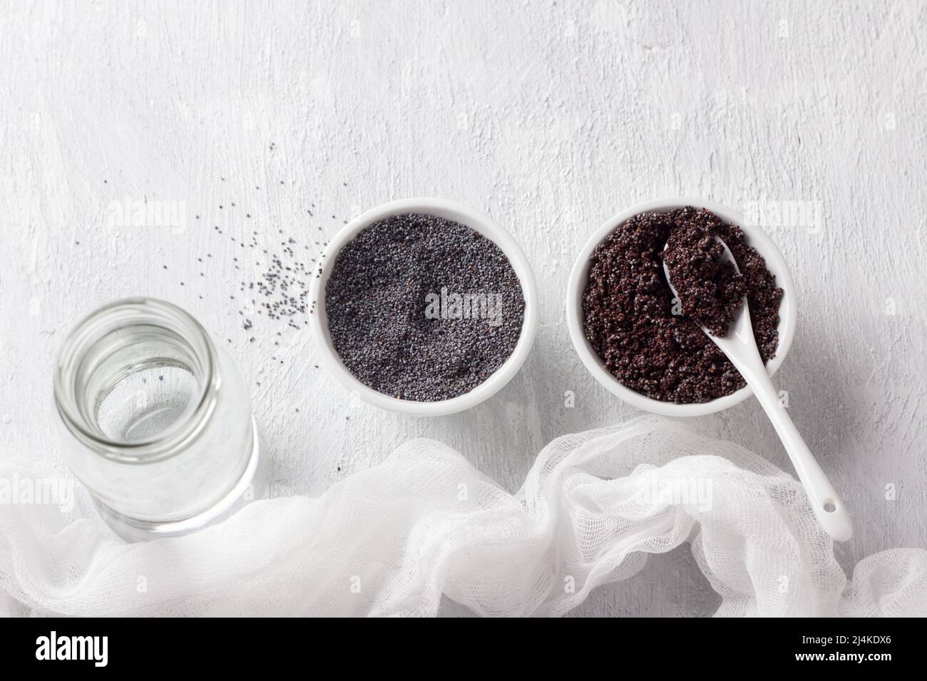 Ingredients for poppy milk. poppy seeds dry and soaked, water in bottle ...