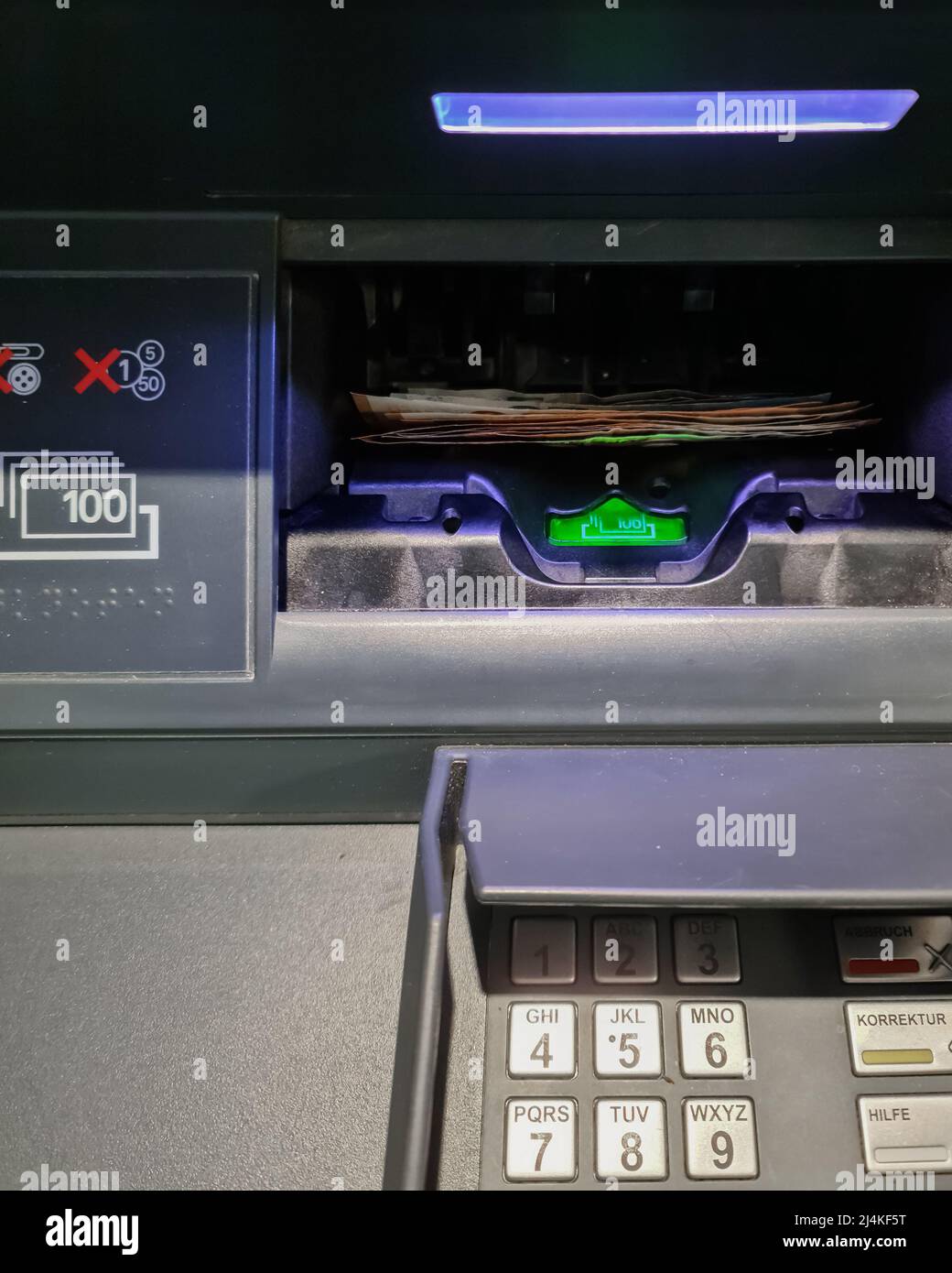 Kiel, Germany - 16. April 2022: A German ATM of the VR Bank - display ...